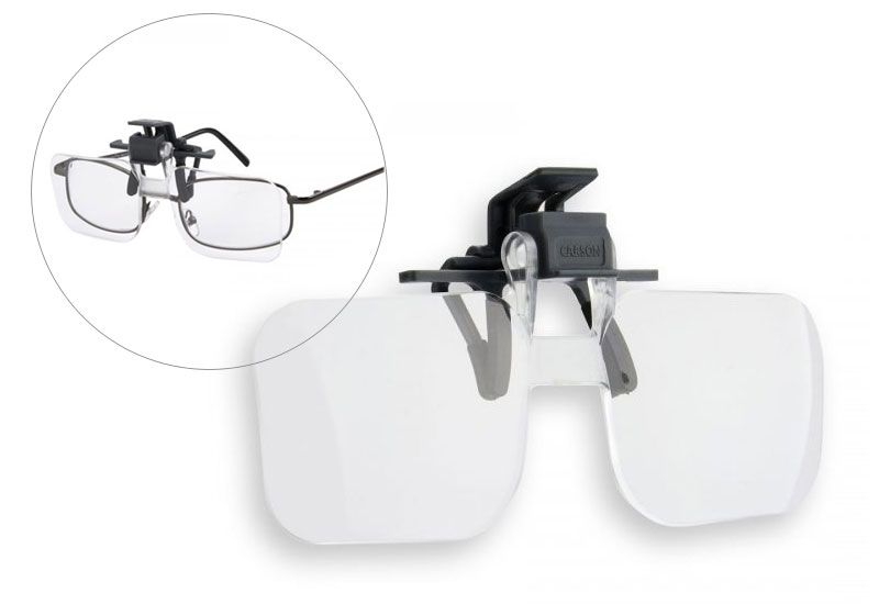 The handy clip-on magnifiers fasten easily to any regular glasses ...